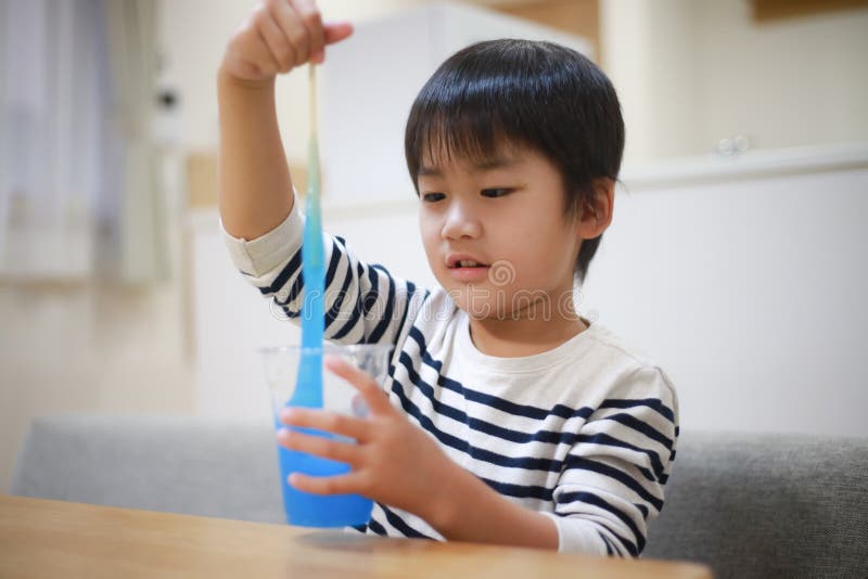 Image of a Boy Making Slime Stock Image - Image of baby, adolescent ...