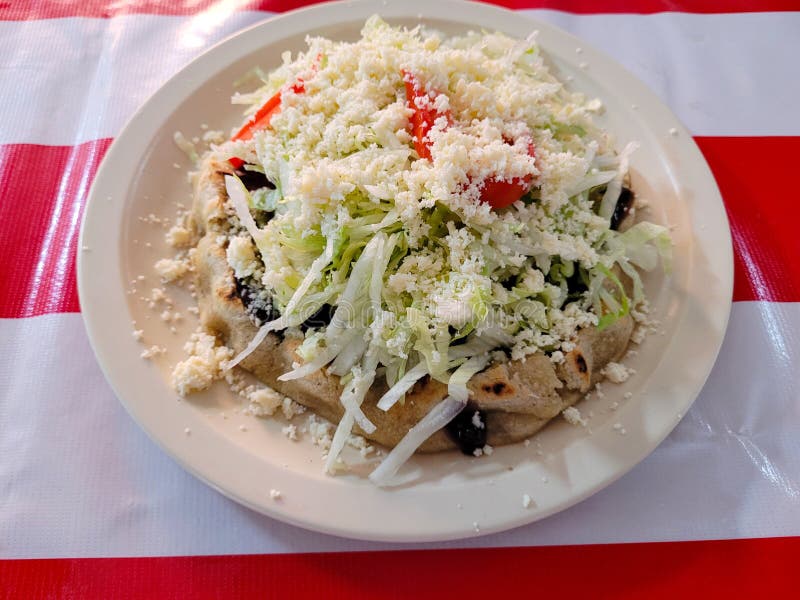 Image of a Sope Served with Beans, Vegetables and Tomato Stock Photo ...