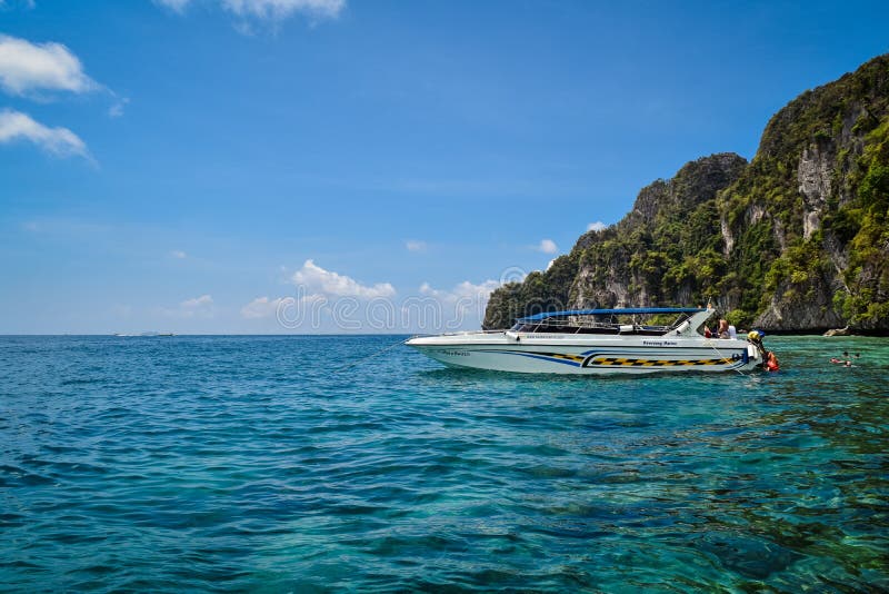 A Speedboat in Sea in Front of Island Editorial Photo - Image of ...