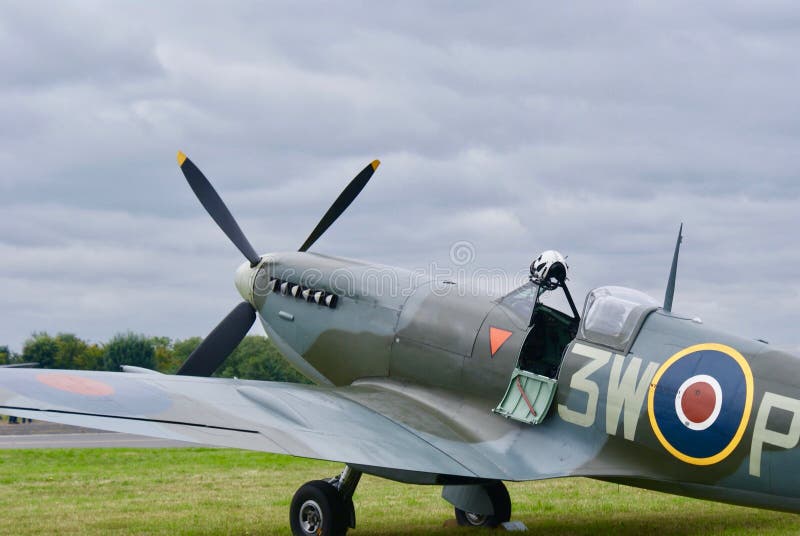 Spitfire Airplane with Helmet Editorial Stock Image - Image of military ...
