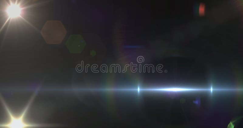 Image of Spotlight with Lens Flare and Light Beam Moving Over Dark ...