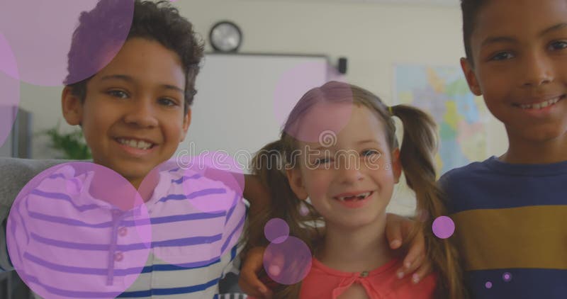 Image of Spots of Pink Light Over Diverse School Children Stock Image ...