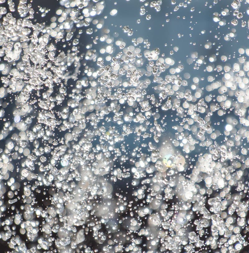 The Image is of a Spray of Water Droplets in the Air Stock Photo ...