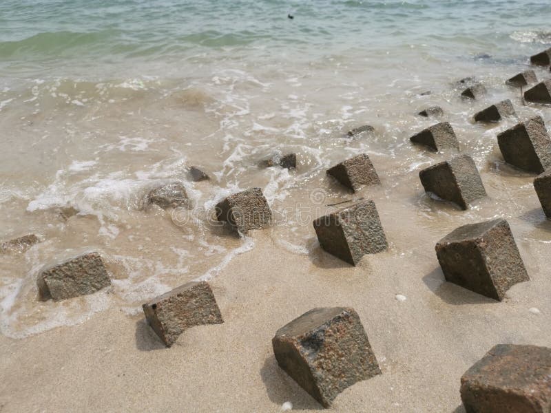 Square-shaped Concrete Coastal Wave Blocker by the Seaside Stock Photo ...