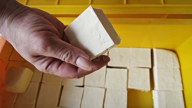 Square-shaped Soft Solid White Tofu Blocks in the Yellow Plastic Tray ...