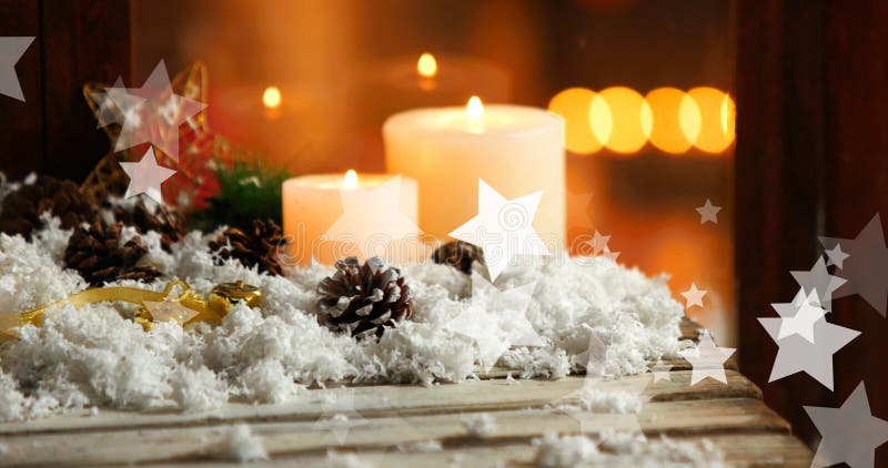 Image of Stars Falling Over Candles and Window at Christmas Stock Photo ...