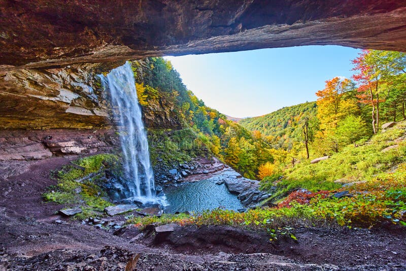 Stunning View in Cave Behind Waterfall with View of Colorful Fall ...