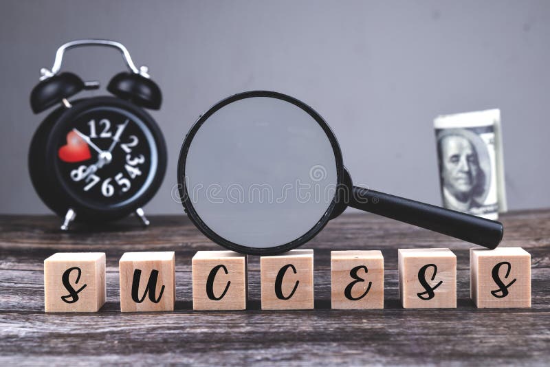 An Image of Success Wording with Selective Focus Image of Magnifying ...