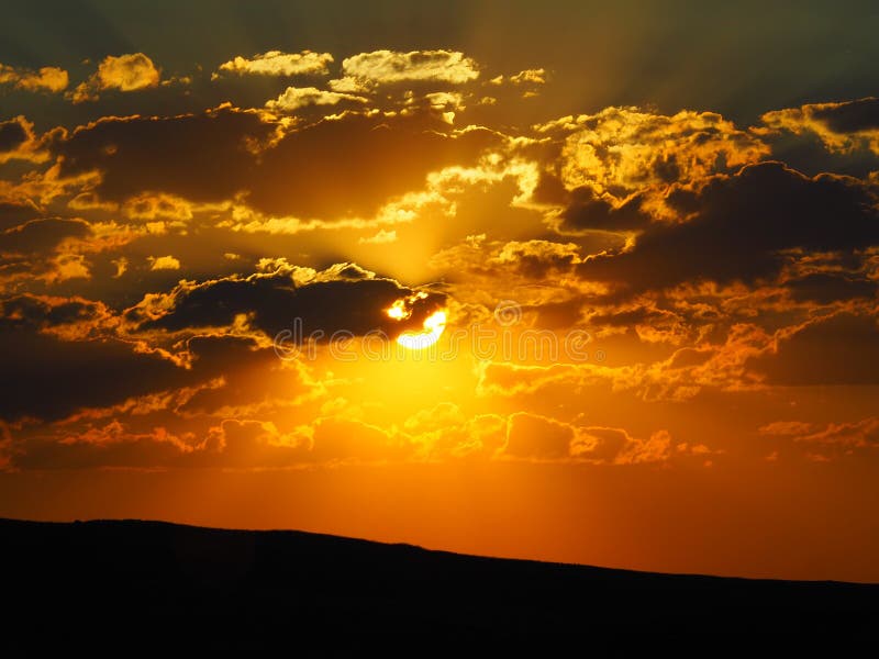 Image of Sunny Sky and Sunset Visible between Clouds Stock Photo ...