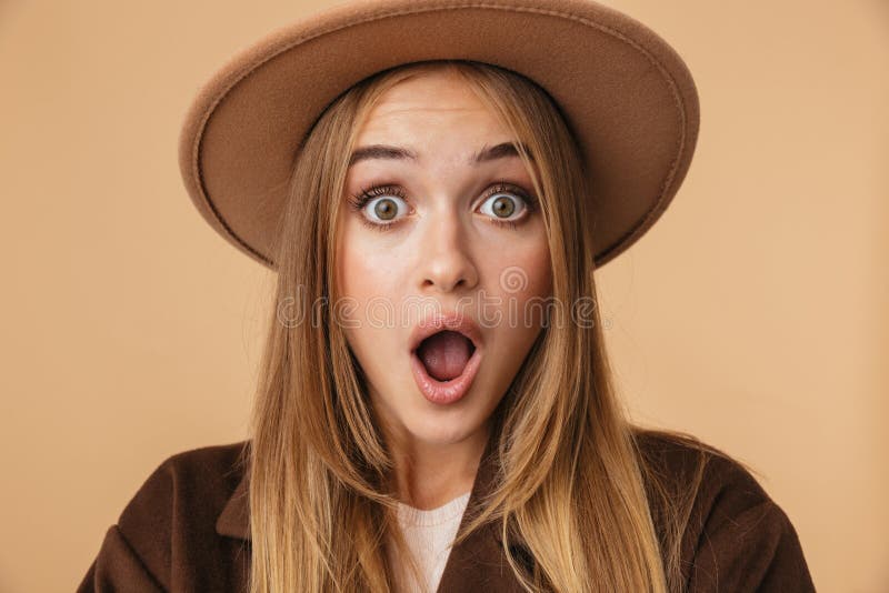 Image Of Surprised Girl Wearing Hat Expressing Wonder With Open Mouth