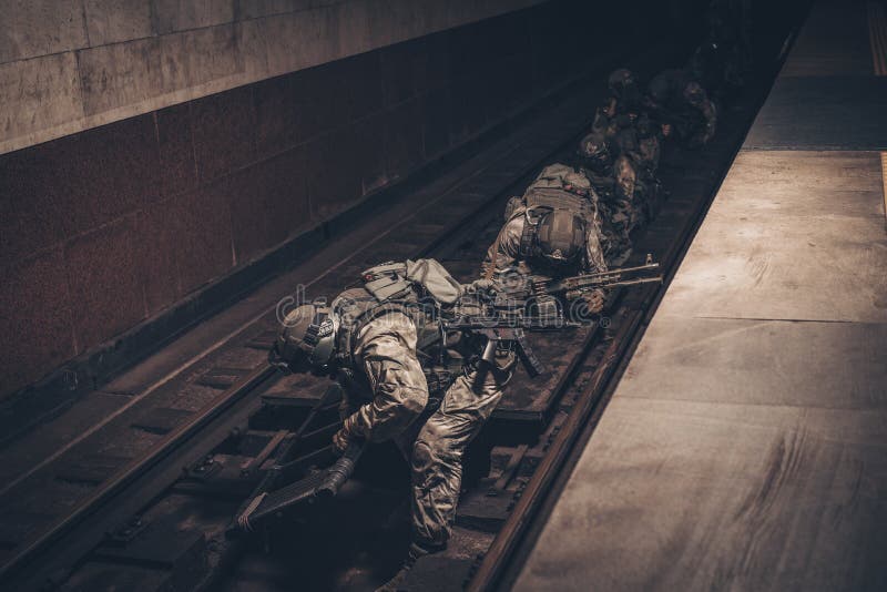 Image of a SWAT Group Sneaking Along the Rails in the Subway. Special ...