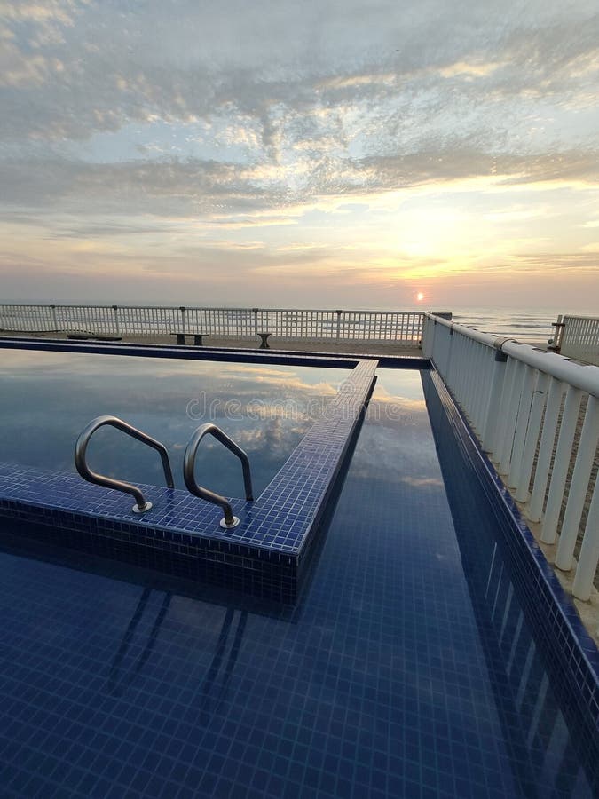 Image of a Swimming Pool Against Sunrise Sky Stock Photo - Image of ...