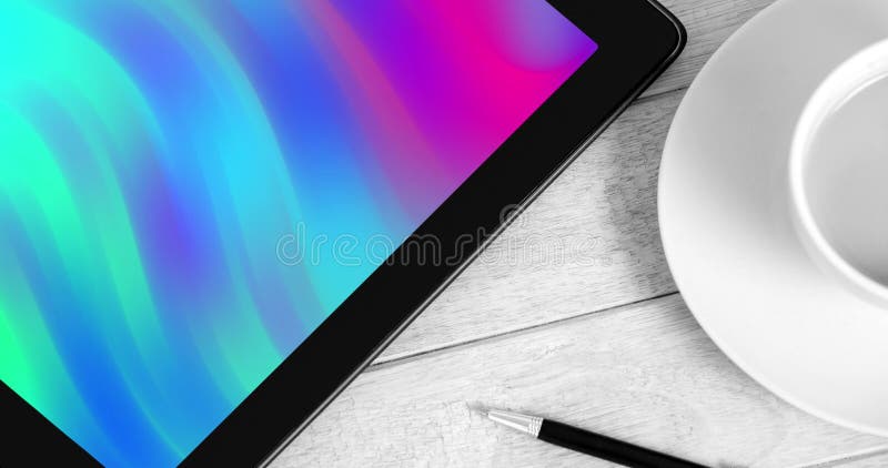 Image of Tablet with Colorful Moving Shapes on Screen on Desk Stock ...