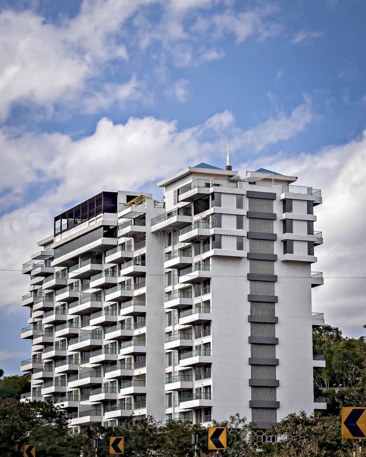 Image of Tall Buildings Under Construction with Blue Sky Background in ...