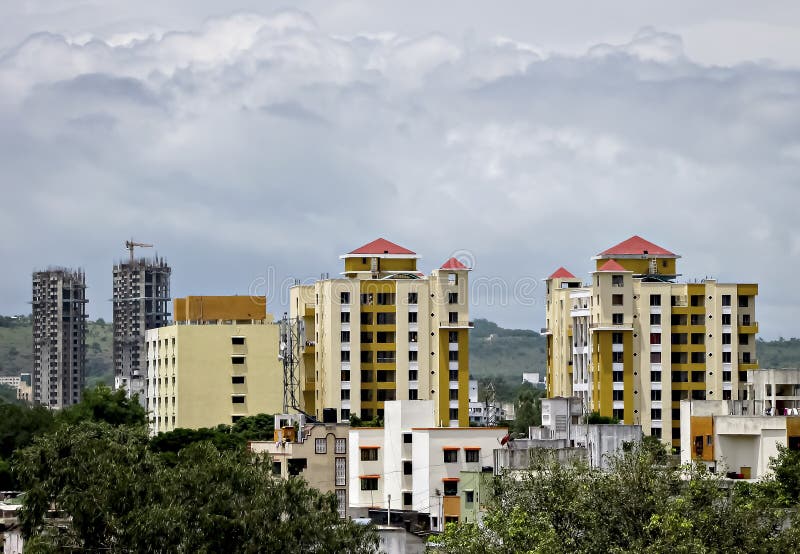 Image of Tall Buildings Under Construction with Blue Sky Background in ...