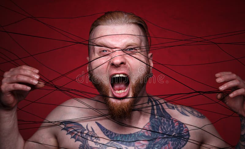 Image of Tangled in Black Threads Bearded Screaming Man Stock Image ...