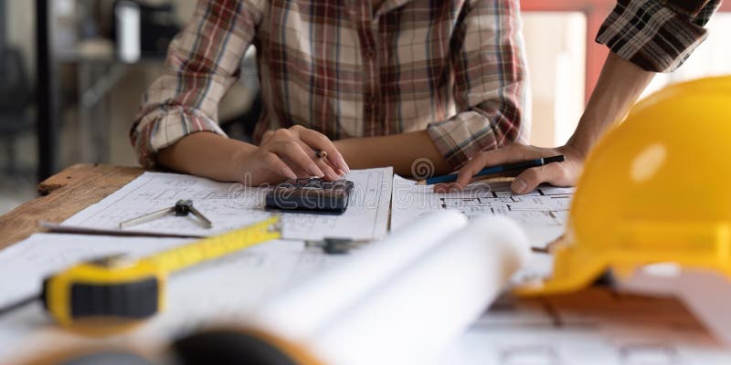 Image of Team Engineer and Architect Discuss for Construction ...