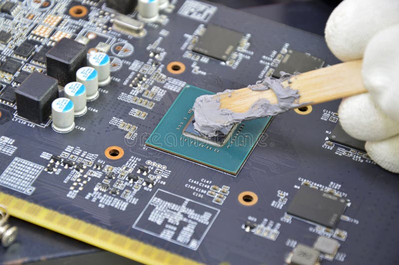 The Image of a Technician Filling a Silicon Cooling Chip CPU Stock ...