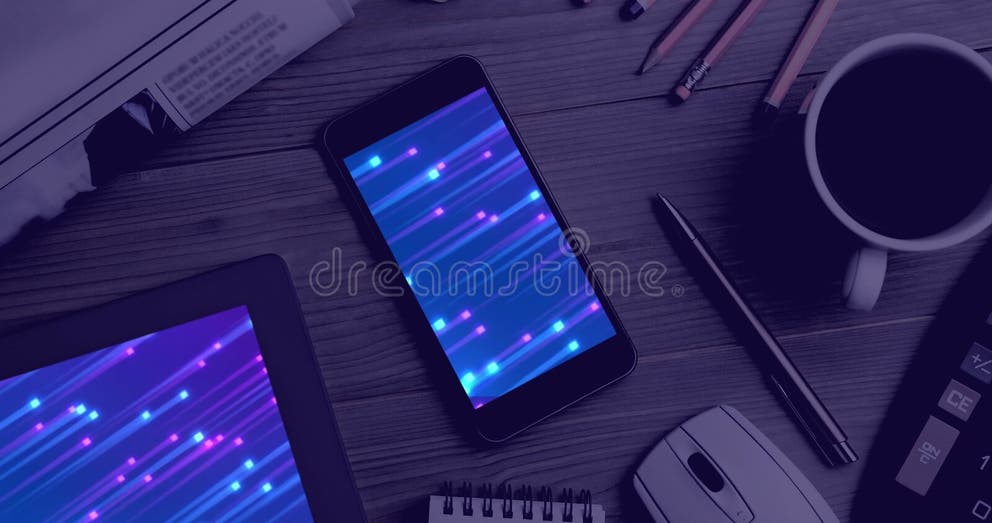 Image of Technological Devices with Light Trails on Screen on Desk ...