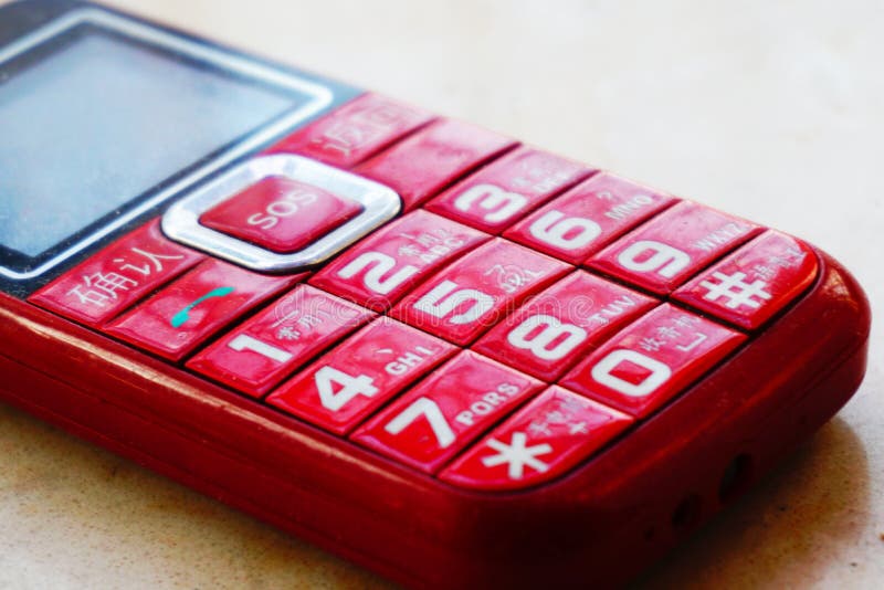 A Red Mobile Phone with Keyboard Stock Image - Image of ornamentation ...