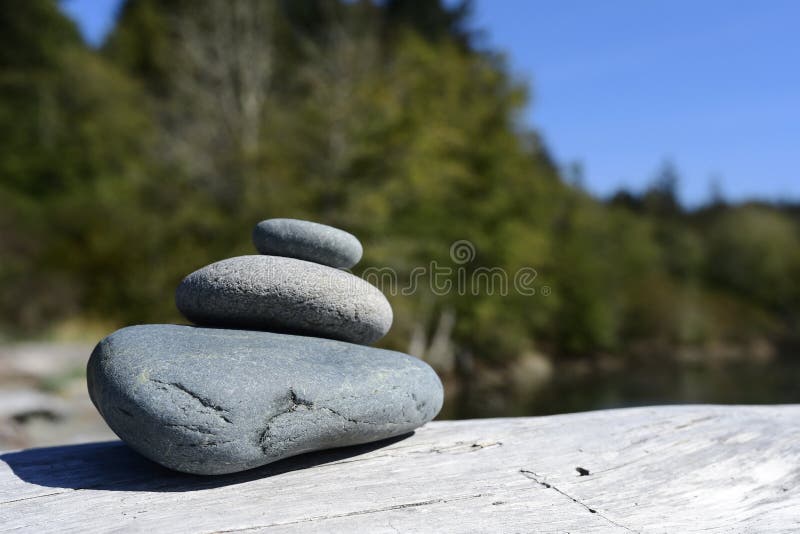 Three Stacked Stones stock image. Image of arrangement - 256074369