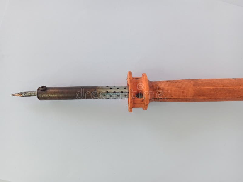 Image of a Tin Soldering Tool, with an Orange Handle Stock Image ...