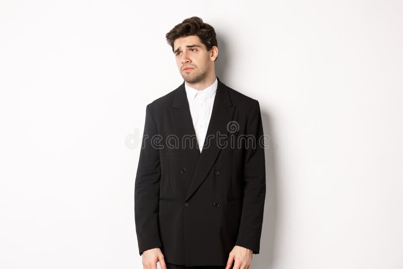 Image of Tired Man in Suit Looking Left with Distressed, Gloomy ...