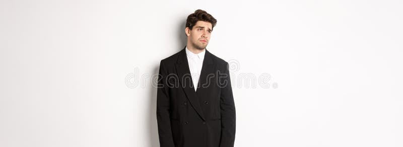 Image of Tired Man in Suit Looking Left with Distressed, Gloomy ...