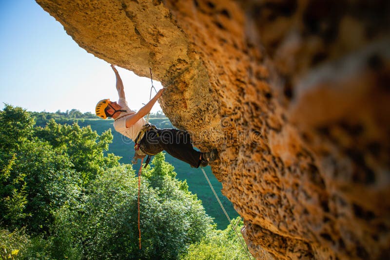 Image Of Tourist Man In Helmet Clambering Up Stock Image - Image of ...