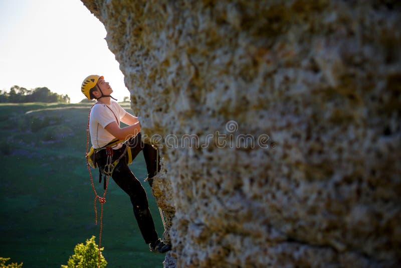Image of Tourist Man in Helmet Clambering Up Stock Image - Image of ...