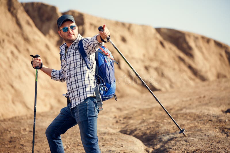 Image of Tourist Man Pointing Stick for Walking Forward on Hill Stock ...