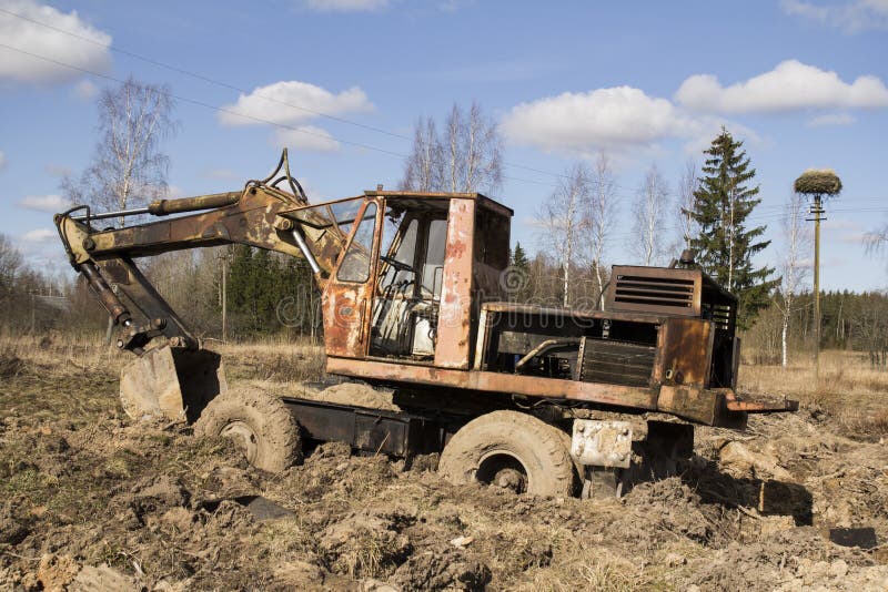 The Image of the Tractor in the Mud Stock Photo - Image of street ...