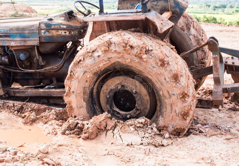 The Image of Tractor Wheel in the Mud Stock Photo - Image of rain ...