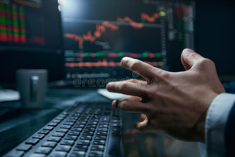 Image of a Trader-investor Sitting at a Computer Desk. Stock Photo ...