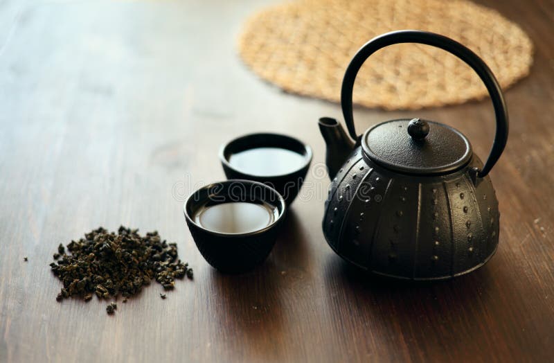 Image of Traditional Eastern Teapot and Teacups on Wooden Desk Stock ...