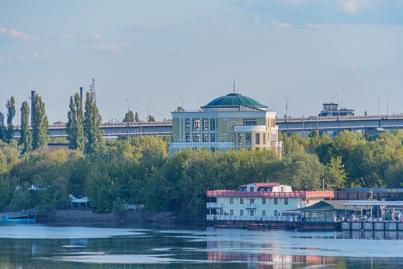An Image of a Tranquil Waterscape with a Neoclassical Building, Trees ...
