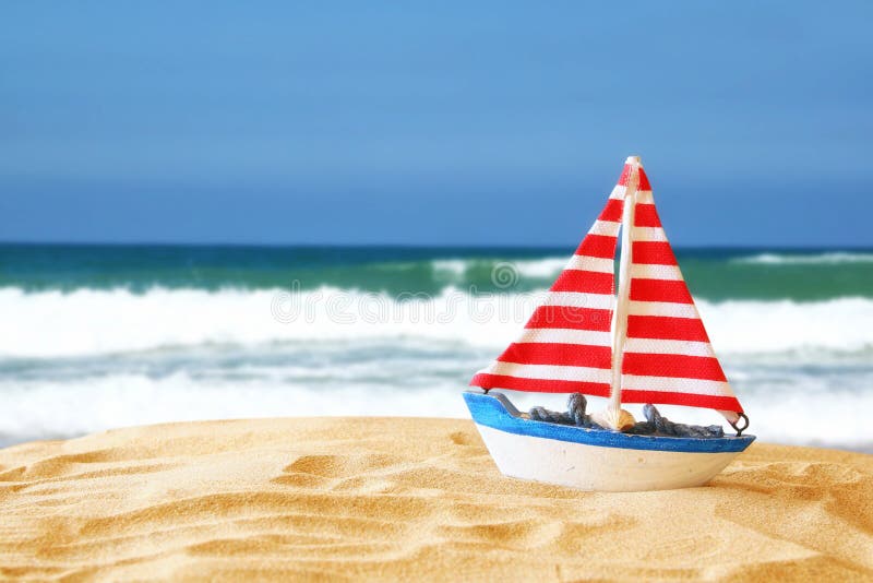 Image of Tropical Sandy Beach and Sailboat Stock Image - Image of ...