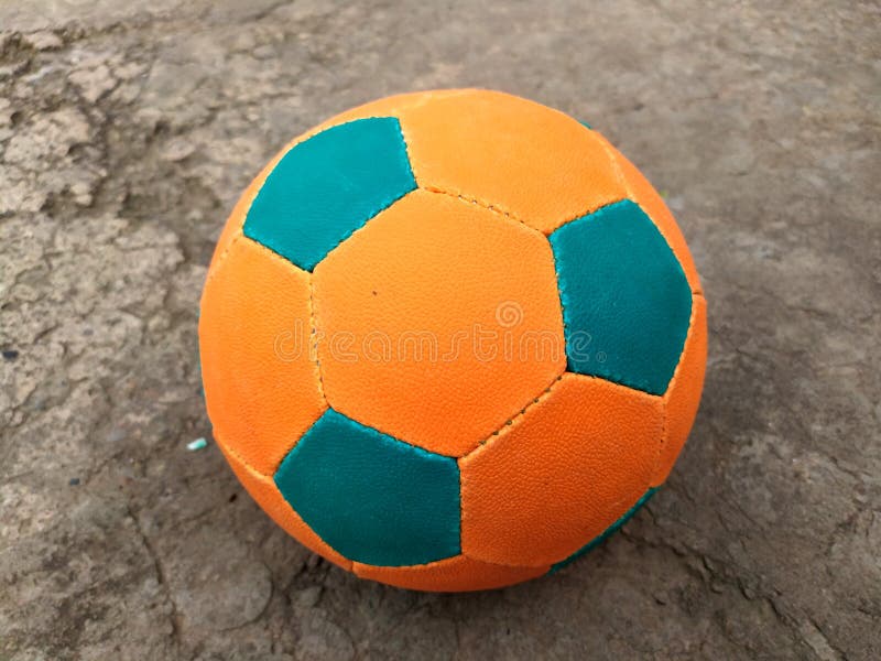 Two Color Ball on Wet Stone Stock Photo - Image of party, game: 191014870