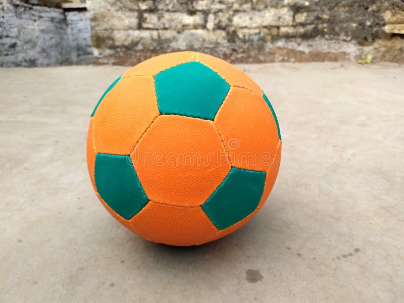 Two Color Ball on Wet Stone Stock Photo - Image of party, game: 191014870