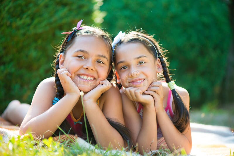 Three Happy Kids in the Field Stock Image - Image of meadow, friendship ...