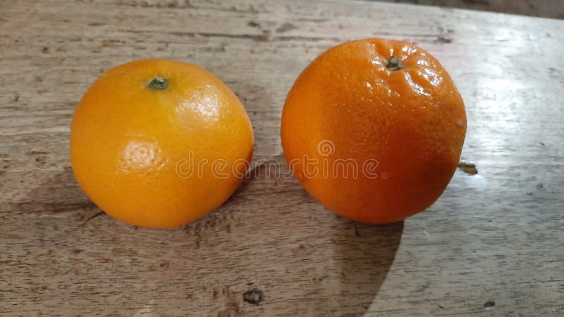 Image of Two Oranges on Desk Stock Photo - Image of desk, india: 171138924