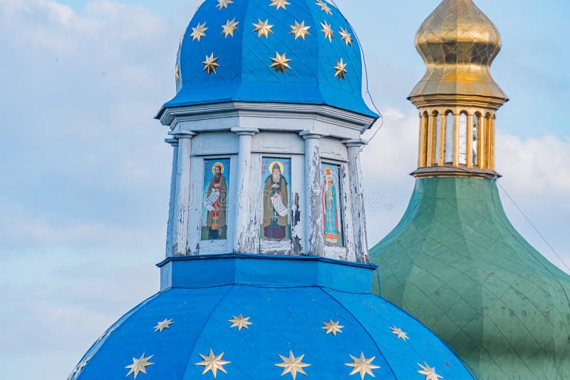Image of Two Traditional Buildings with Distinct Blue and Green Domes ...