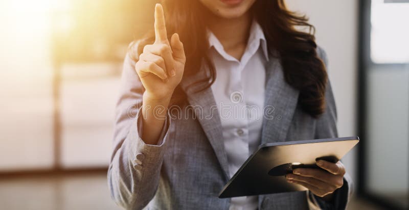 Image of Two Young Businessmen Using Touchpad at Meeting Stock Image ...