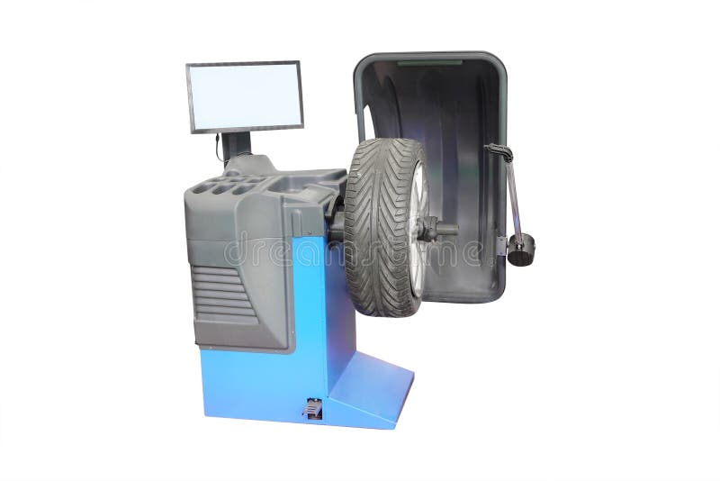 Tyre Fitting Machine and the Sets of Wheels Stock Image - Image of ...