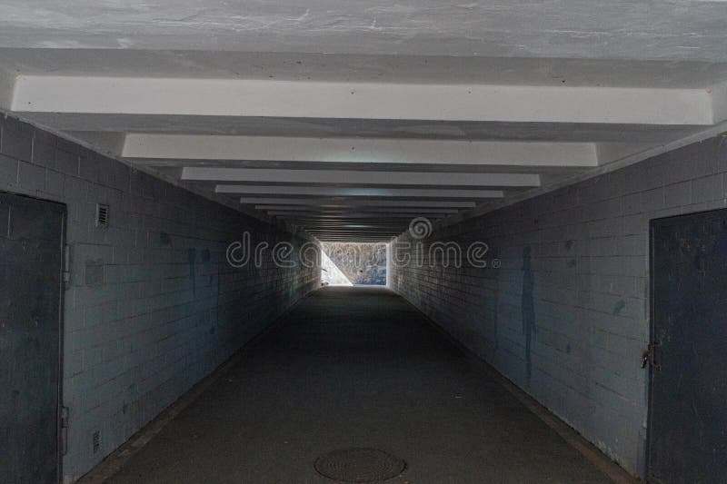 Image of an Underground Corridor, Possibly a Subway Tunnel, Illuminated ...