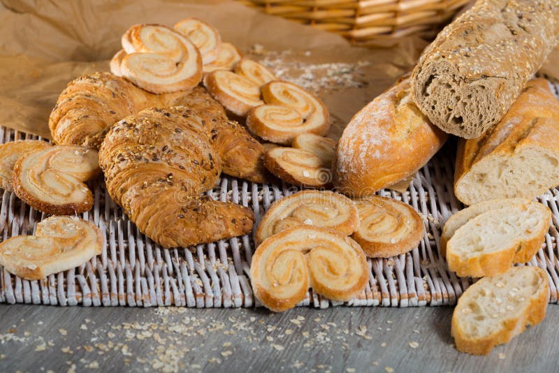 Various Kinds of Bread and Bakery Products on Table Stock Photo - Image ...