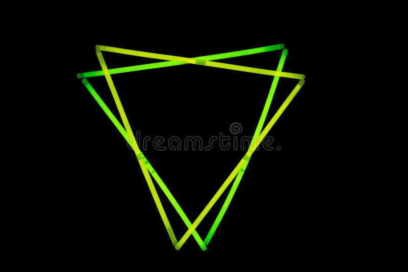 Image of Vibrant Triangles Green Neon Glow Sticks Over Black Background ...
