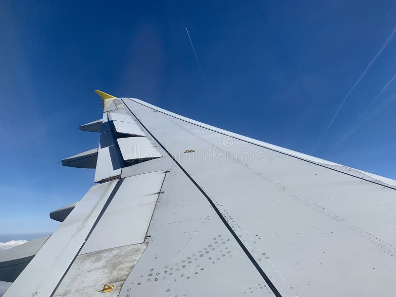 View of the Aircraft Wing from the Porthole Stock Photo - Image of ...