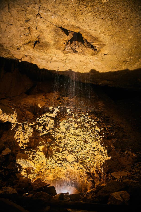 Cave with Dripping Water, and View of the Valley Below Stock ...