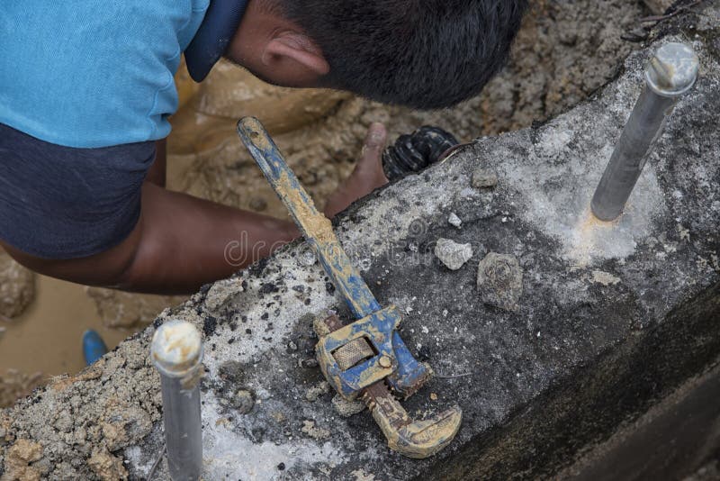 Waterworks Worker Repairing the Water Ferrule Valve Pipe from Leakage ...